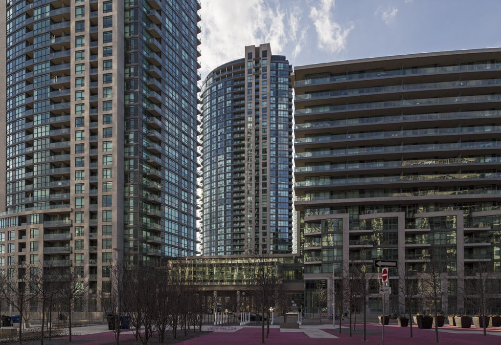 20170308. The towers of Waterpark City rise over pink June Callwood ...