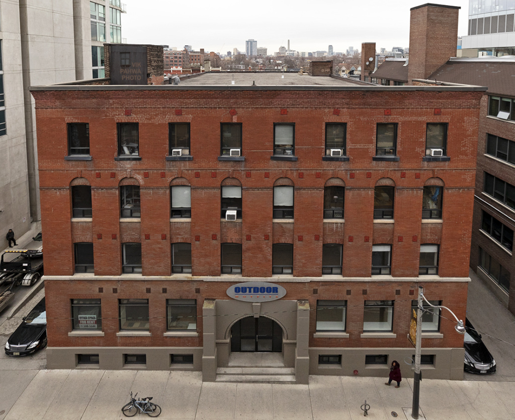 20190509. 372 Richmond St W, a four-storey brick and beam building ...