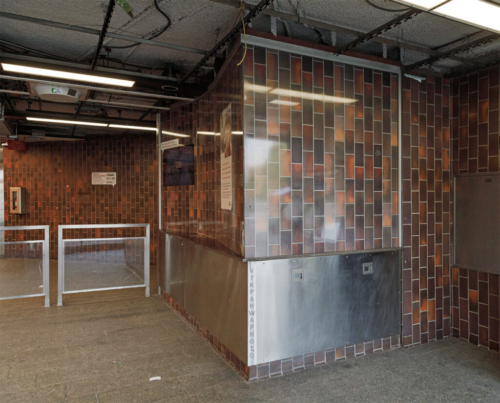 20240807. Glencairn Station III. A TTC operator booth in camouflage ...